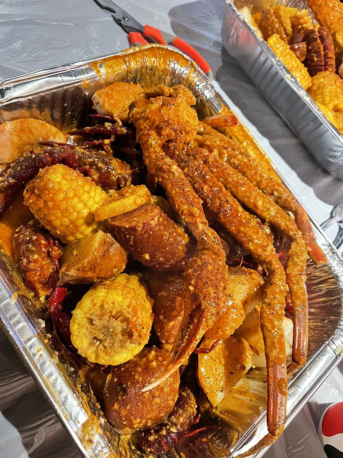 Seafood, corn, and potatoes swimming in spiced butter sauce&mdash;a beautiful mess that's worth every napkin. Plastic bibs become fashion statements here.