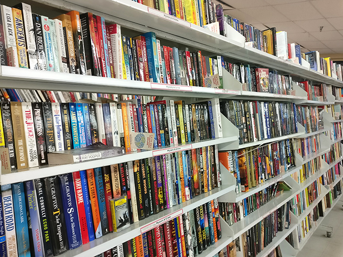 The book section – a paper playground where literary adventures cost less than a cup of coffee.