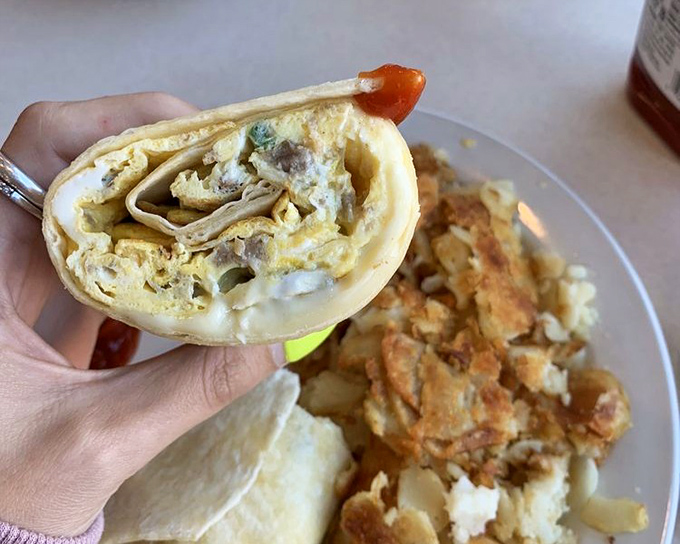 Breakfast engineering at its finest&mdash;this wrap reveals layers of fluffy eggs, melted cheese, and savory fillings that put ordinary breakfast sandwiches to shame.