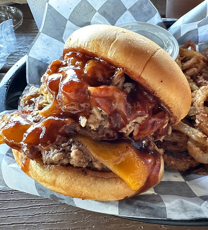This isn't just a burger&mdash;it's an architectural marvel of beef, cheese, and sauce that requires both hands and zero shame.