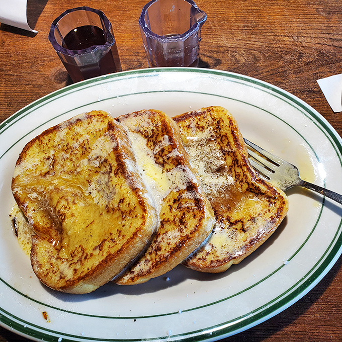 French toast that's achieved golden-brown perfection. The kind that makes you wonder why you ever settled for lesser breakfast experiences.