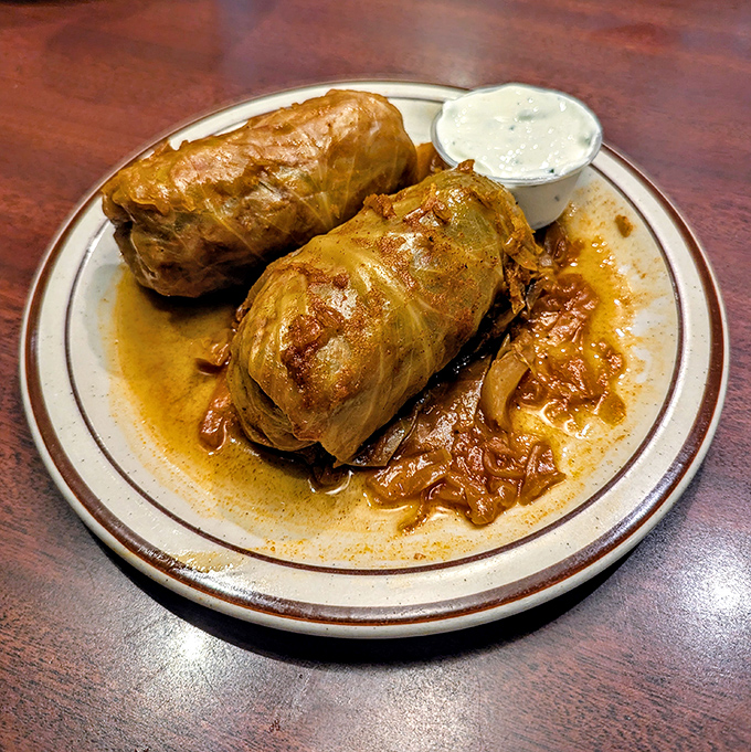 Hungarian cabbage rolls that your grandmother would approve of&mdash;if she were Hungarian. The side of sour cream adds that perfect tangy counterpoint to the savory filling.