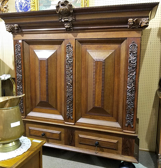 This magnificent wooden cabinet with intricate carvings isn't just furniture&mdash;it's functional sculpture that has outlived several generations of its admirers.