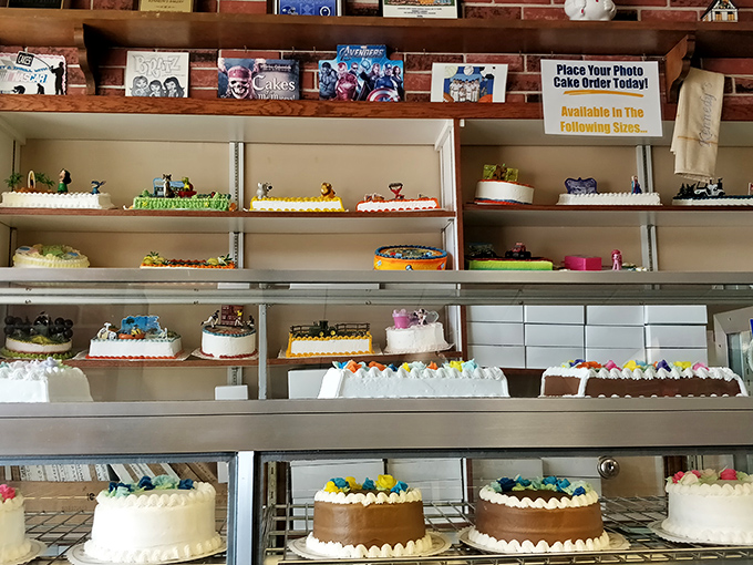 That cake display showcases everything from superhero themes to elegant classics &ndash; because every celebration deserves something spectacular and homemade.