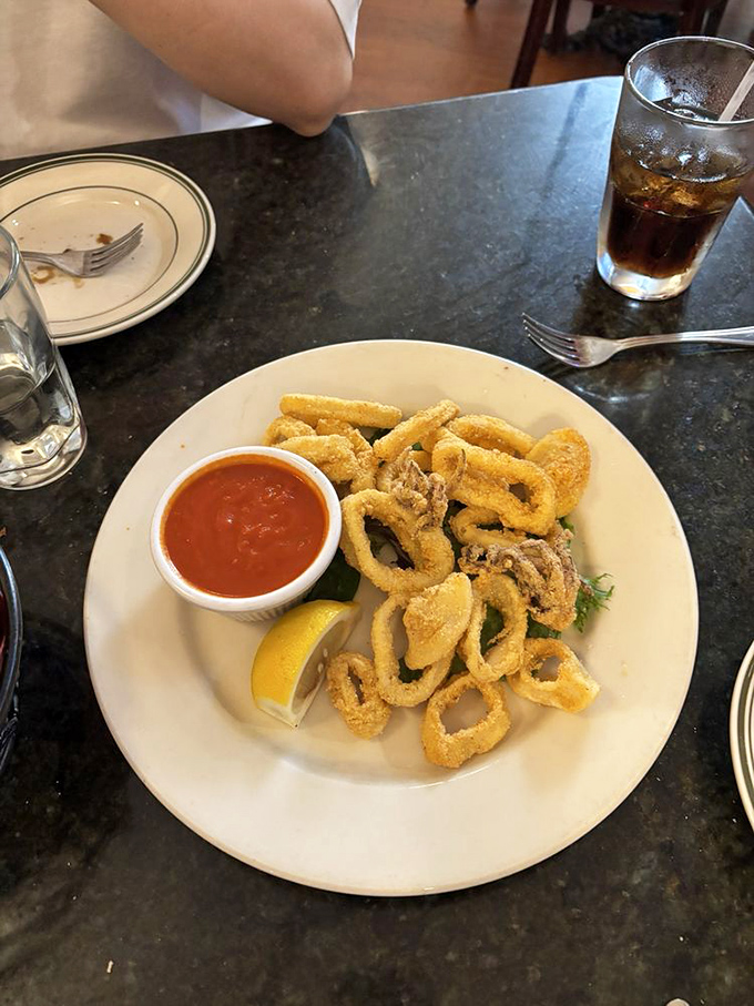 Golden-fried calamari that crackles with each bite, served with marinara that's worth double-dipping despite what your mother taught you.