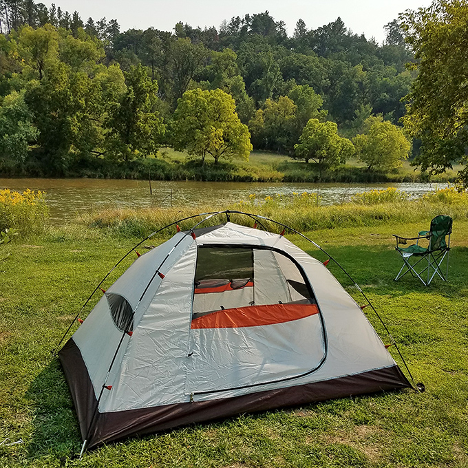 Riverside camping that turns "roughing it" into "perfect evening." Just add marshmallows and stargazing for the full experience.