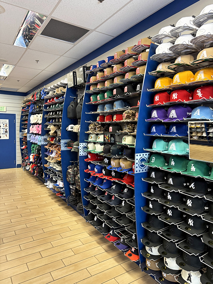 Baseball cap heaven for folks who enjoy protecting their heads while displaying their allegiances in colorful, organized fashion.