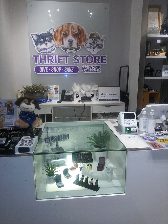 The checkout counter doubles as mission control, complete with adorable animal ambassadors reminding you where your dollars are headed.