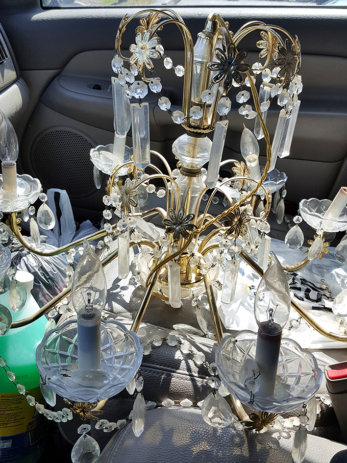 This chandelier drips with elegance and crystal, waiting to class up someone's dining room on a budget.