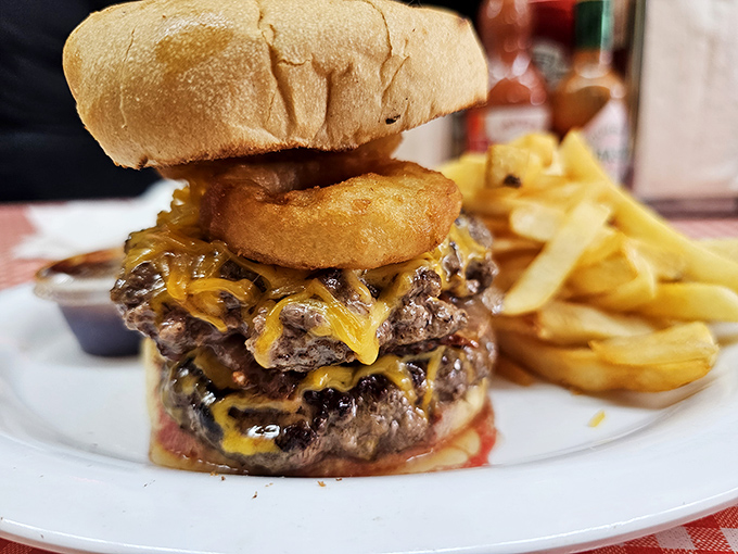 This towering cheeseburger with an onion ring crown might require unhinging your jaw, snake-style, to consume.