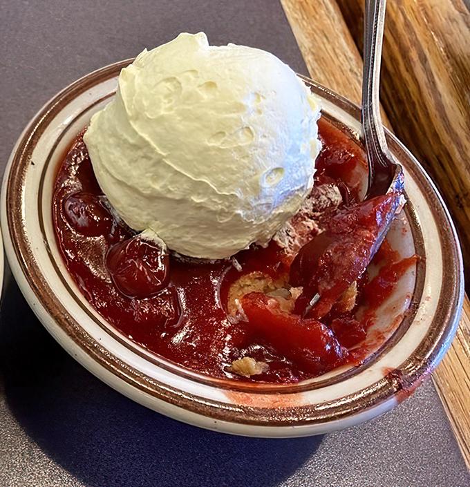 Cherry cobbler crowned with vanilla ice cream&mdash;the kind of dessert that makes you consider skipping the main course next time.