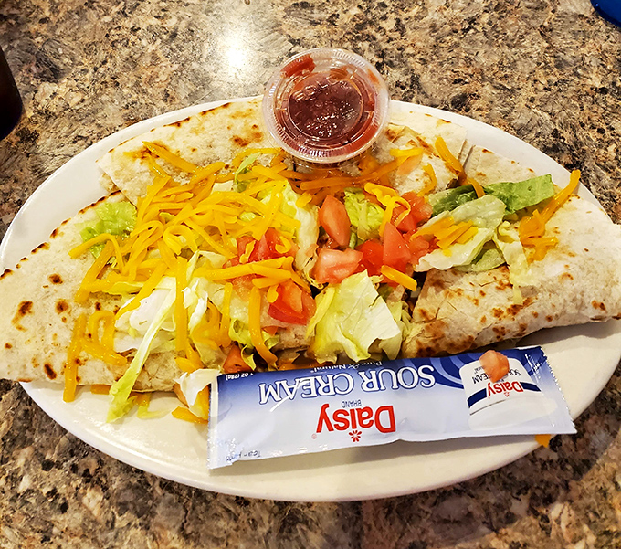 This quesadilla doesn't just have cheese&mdash;it has an entire dairy farm's worth, plus enough fresh veggies to count as a salad. Almost.