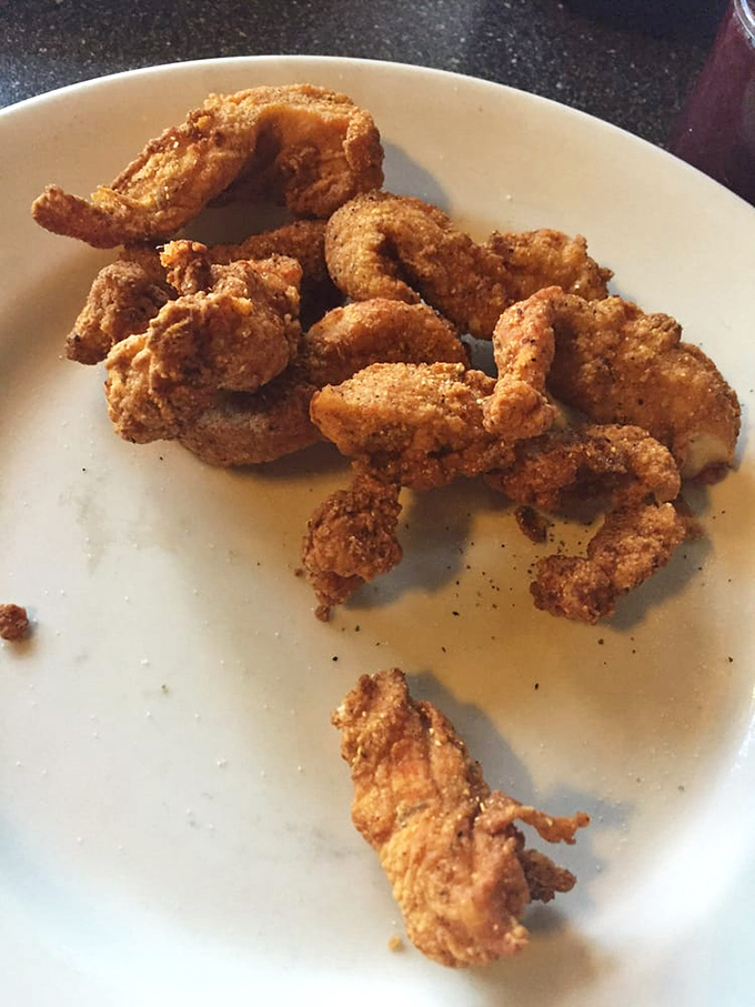 These golden-brown chicken tenders aren't just fried &ndash; they're transformed into crunchy vessels of joy that make adults remember why kids' menus exist.