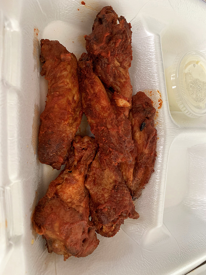 These wings aren't trying to be trendy with exotic flavors&mdash;they're too busy being perfectly crispy, smoky time machines to simpler days.