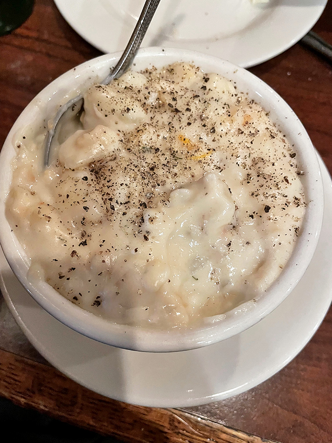 The legendary clam chowder&mdash;creamy, generous with clams, and seasoned with enough black pepper to remind you this isn't some dainty soup course.