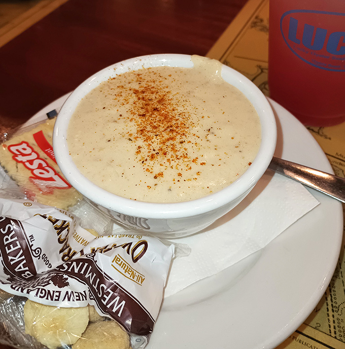 Clam chowder so creamy it should come with a warning label. That dusting of paprika on top? The culinary equivalent of a cherry on a sundae. 
