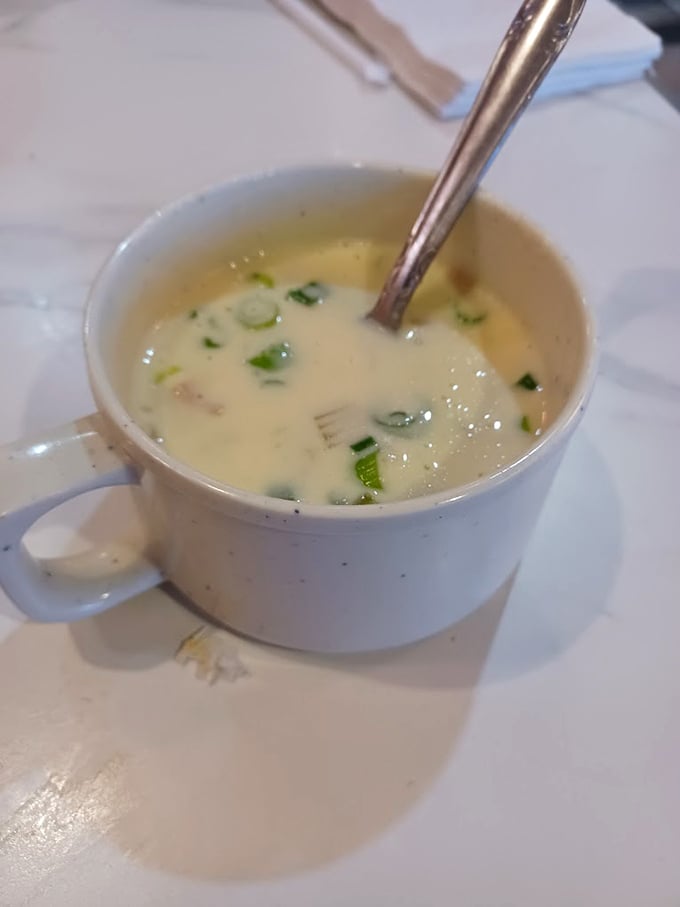 A steaming cup of clam chowder that whispers, "Desert? What desert?" Creamy comfort knows no geographic boundaries.