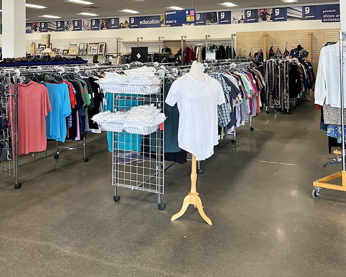 The clothing section stretches to the horizon, a textile sea where fashion trends of decades past mingle with modern castoffs.