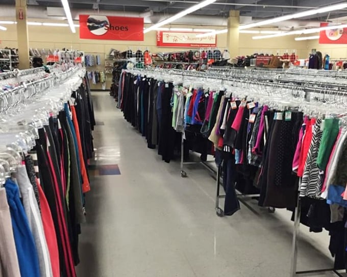 The clothing aisles stretch like runways of possibility, where fashion meets function and yesterday's trends await rediscovery.