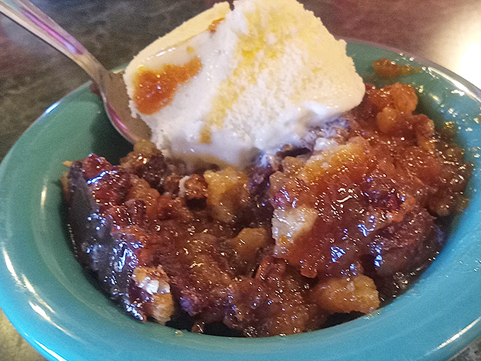 This cobbler isn't just dessert&mdash;it's a warm hug in a bowl, topped with ice cream that's melting with excitement to meet its fruity companion.
