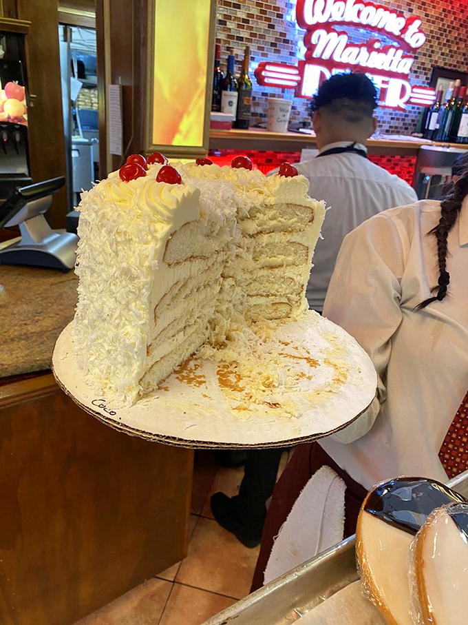 That's not just cake&mdash;it's a towering monument to the art of dessert. Six layers of vanilla bliss topped with cherries.