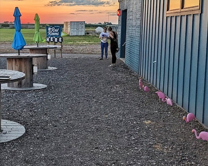 As twilight approaches, the concession area becomes a gathering spot where strangers become temporary neighbors united by movie magic.