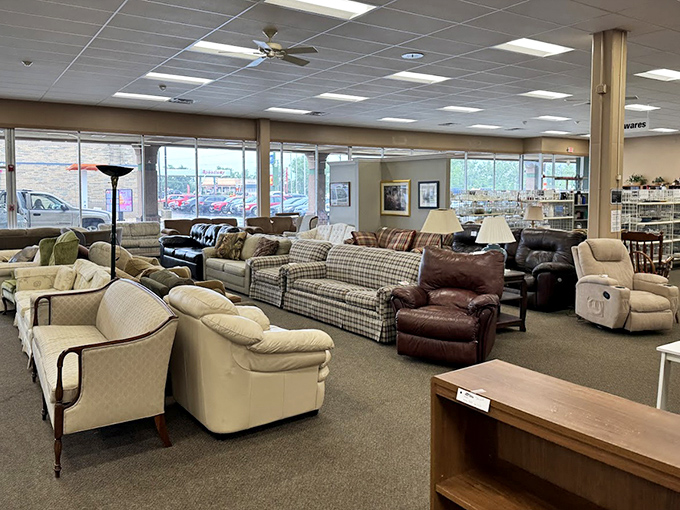 The couch collection resembles a living room showroom from every decade since the 1970s. That leather recliner is practically begging you to take it home.