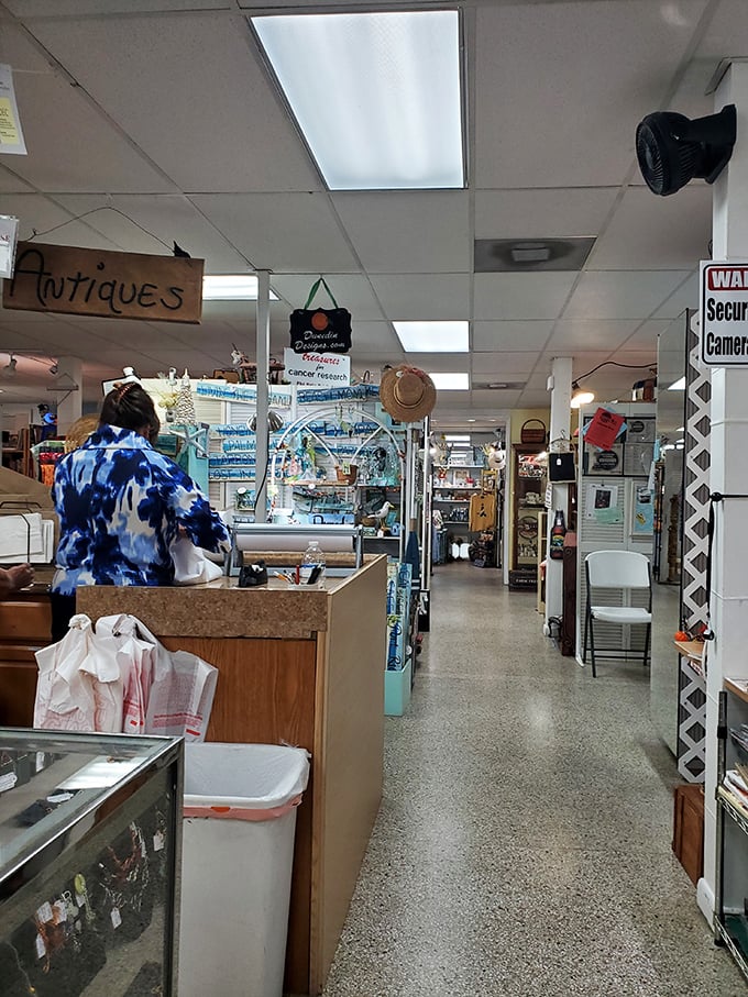 The nerve center of vintage commerce, where treasures are tallied and stories exchanged. Every transaction begins and ends at this humble counter.