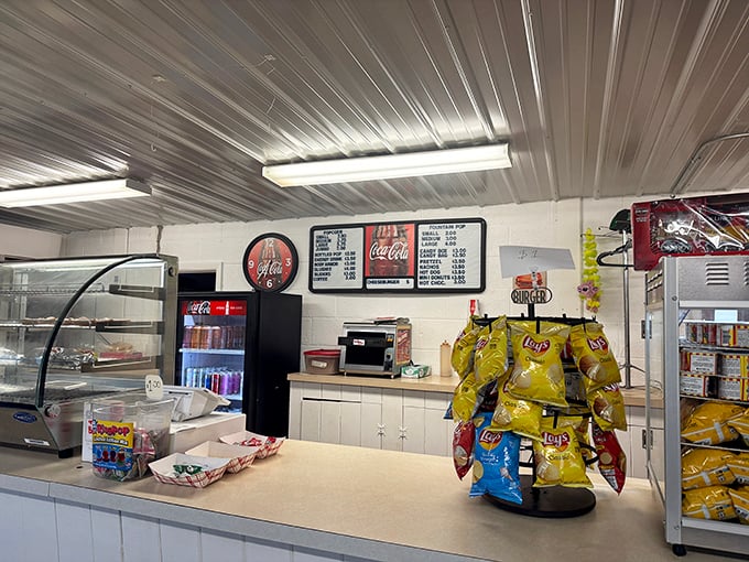 Inside the concession stand, nostalgia is served alongside Coca-Cola and those chip bags that crinkle during the quiet scenes.