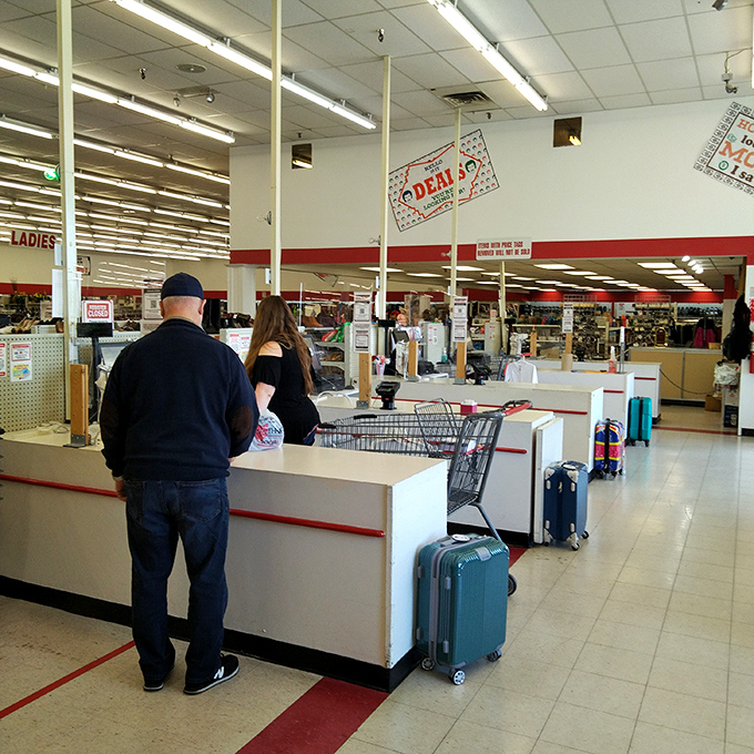 The checkout counter: the finish line of your bargain marathon. Those suitcases suggest someone's about to travel home with quite the haul.