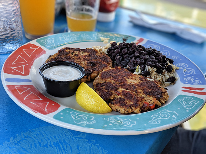Behold the crab cakes that launched a thousand return visits, served with black beans that aren't just an afterthought.