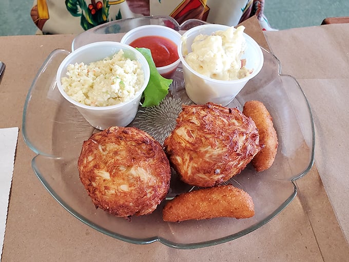 The legendary crab cakes&mdash;golden-brown perfection that's mostly crab and just enough binding to keep the dream together. Worth every mile of the journey.