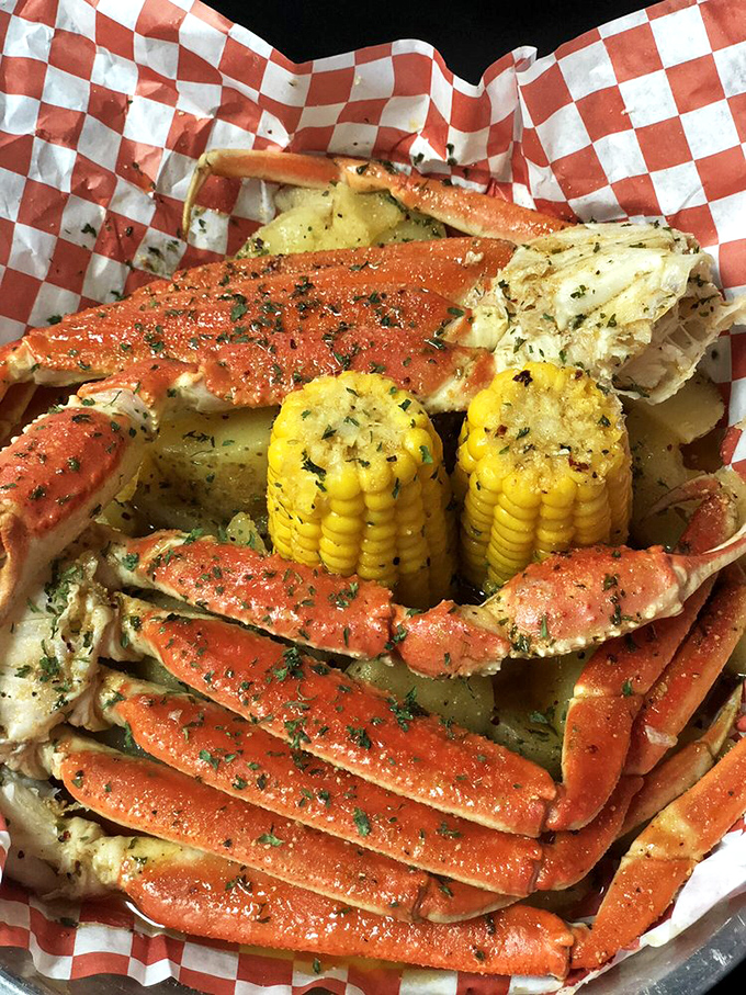 Crab legs splayed like a crustacean sunbather, glistening with herb-flecked butter. This is what seafood dreams are made of&mdash;sweet meat waiting to be discovered. 