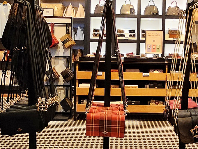 Handbag heaven where luxury meets affordability. That plaid crossbody is practically begging to go home with someone.