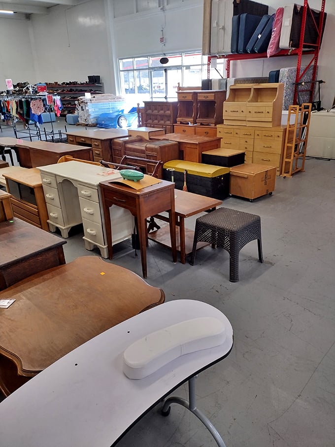 Desks and drawers and cabinets, oh my! The perfect home office might be hiding in this wooden furniture jungle.