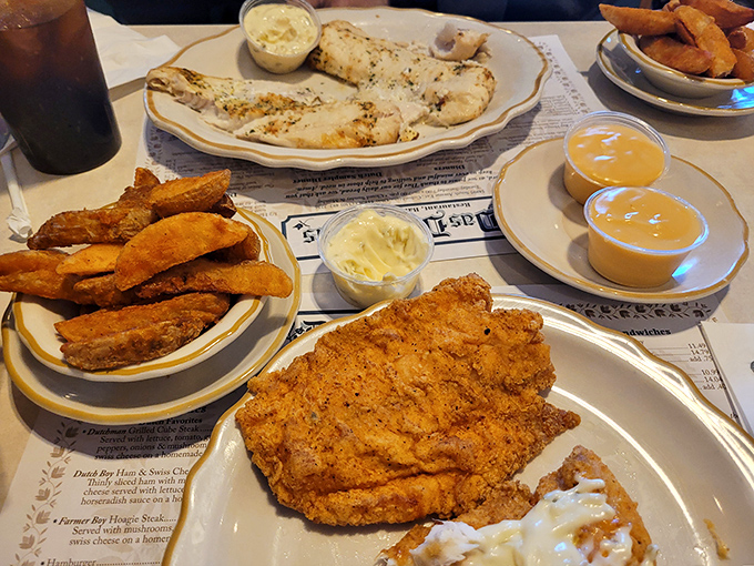 Golden-fried perfection meets homestyle sides&mdash;a plate that says "diet starts tomorrow" in the most convincing way possible.