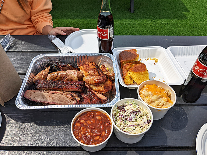 The full barbecue experience, complete with sides and Mexican Coke&mdash;proof that happiness can indeed be packed in takeout containers.