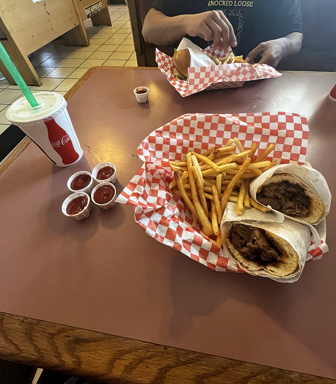 The universal language of good food, spoken fluently with wraps, fries, and enough sauce cups to satisfy even the most dedicated dipper.