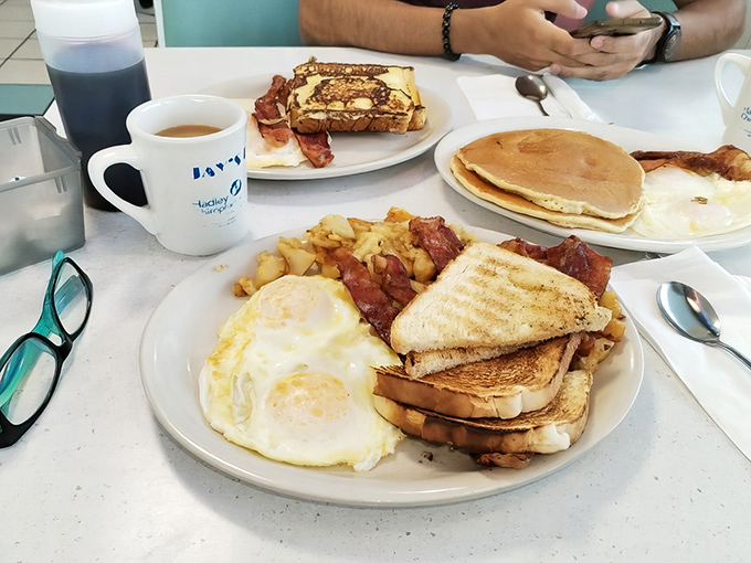 The full breakfast spread at Jay's proves that morning meals deserve the same respect as their fancier dinner cousins.