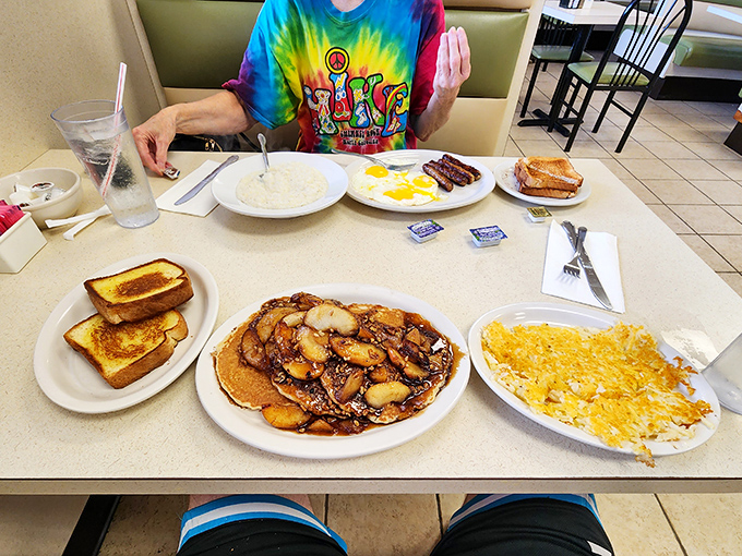 Pancakes dripping with banana-caramel goodness, scrambled eggs, and golden toast. The breakfast trifecta that makes waking up worthwhile.