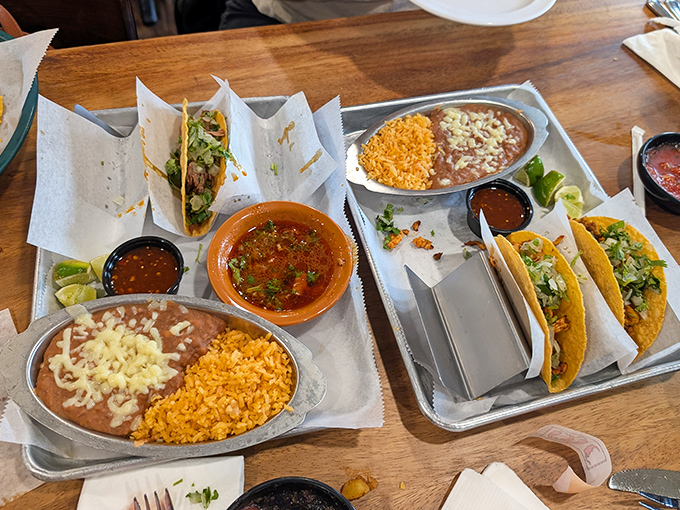 Taco Tuesday elevated to an art form. This spread isn't just dinner&mdash;it's a choose-your-own-adventure of flavors with rice and beans as trusty sidekicks.