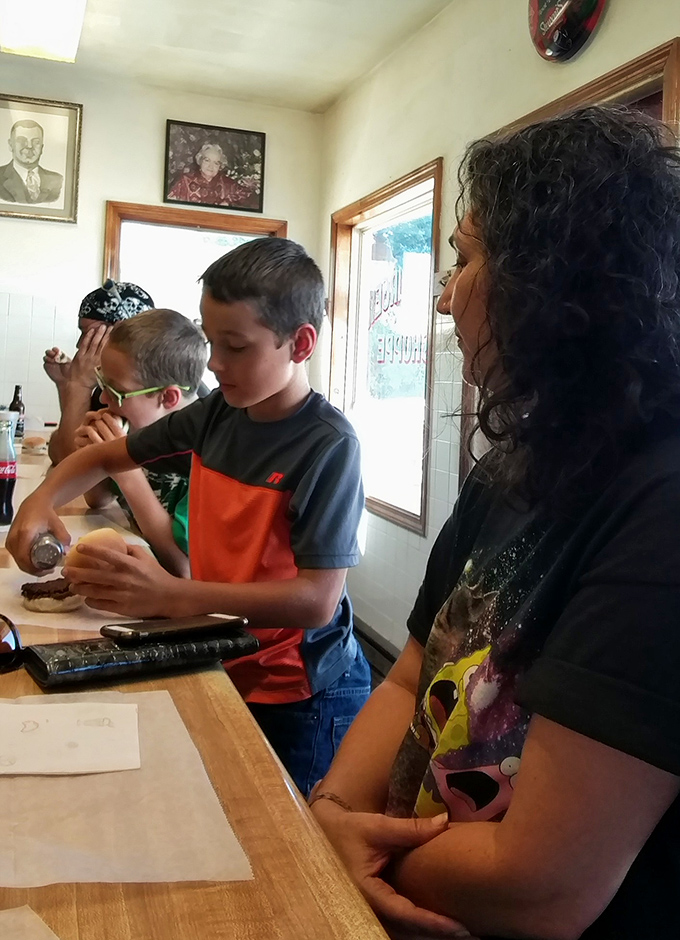 Young diners experiencing the magic of Crabill's for the first time, creating memories that will bring them back decades from now.