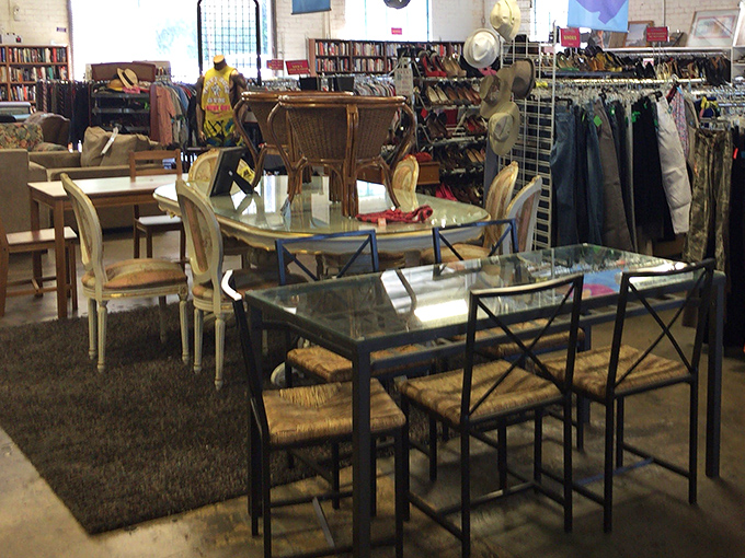 Dining sets arranged like a furniture showroom fever dream – mid-century modern meets grandma's formal dining room in the best possible way.