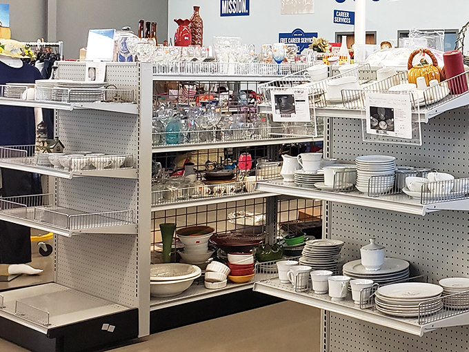 Dinnerware displays that could host a royal tea party or casual Sunday brunch. White plates, colorful bowls, and forgotten serving pieces waiting for their second act.