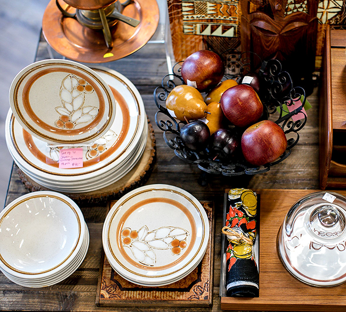 Vintage dishware that tells stories of dinner parties past. These floral plates have seen more interesting conversations than most therapists.