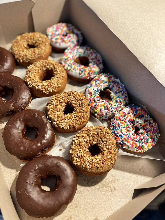 The donut box&mdash;where good intentions about "just having one" go to die amid a rainbow of frosting and sprinkles.