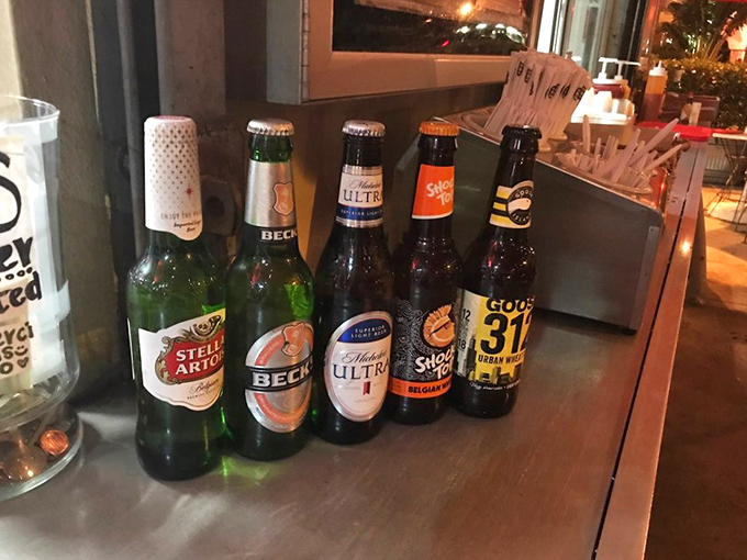 The international beer lineup stands at attention, ready to cool you down after a day in the Miami heat or complement your hot dog adventure.