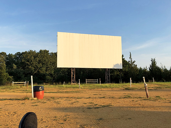 Morning light reveals the sleeping giant. This blank canvas will transform into worlds of adventure, romance, and thrills when darkness falls.