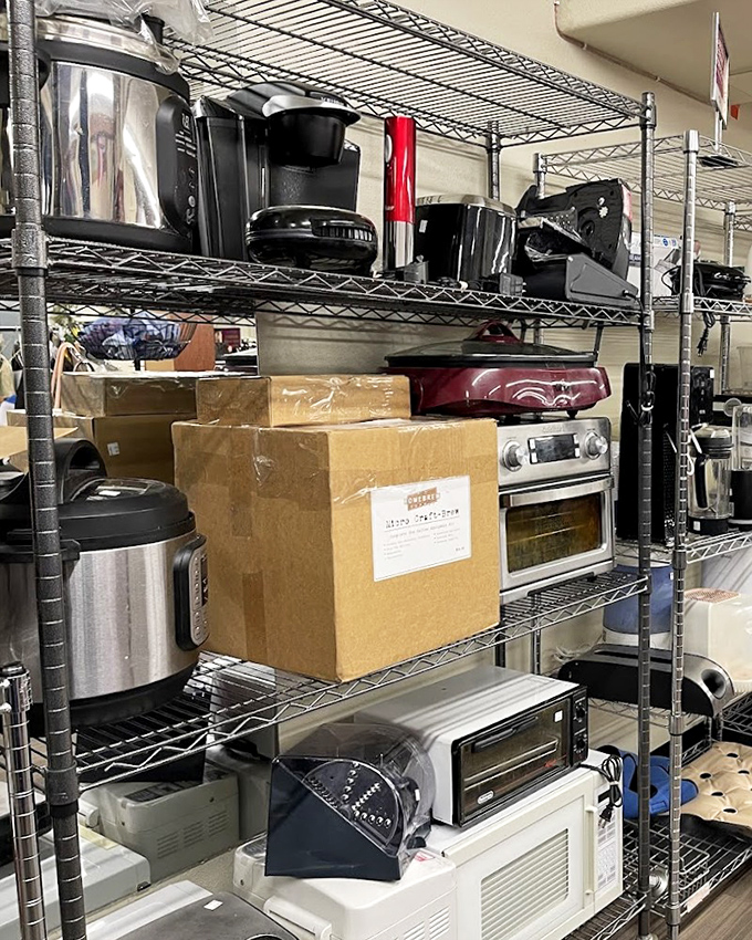 Kitchen appliances stand at attention, ready for adoption. That toaster oven has stories to tell and many more brunches to serve.