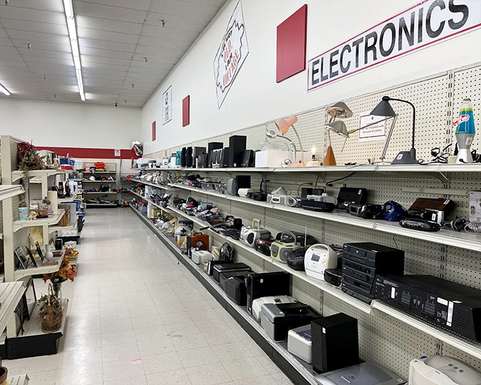 The men's clothing section arranges shirts by color, creating a rainbow effect that makes finding that perfect blue polo feel like a treasure hunt victory.